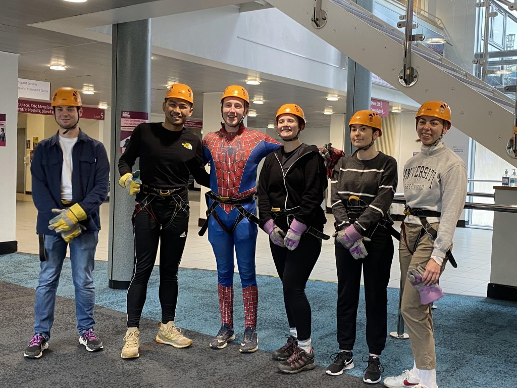 Volunteers take on an abseil challenge down Sheffield's Owen building ...